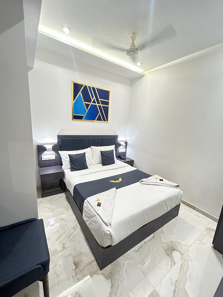 Deluxe Room/ Single Sharing Rooms - MIG SUITES - Premium Lodging Hotels ...
